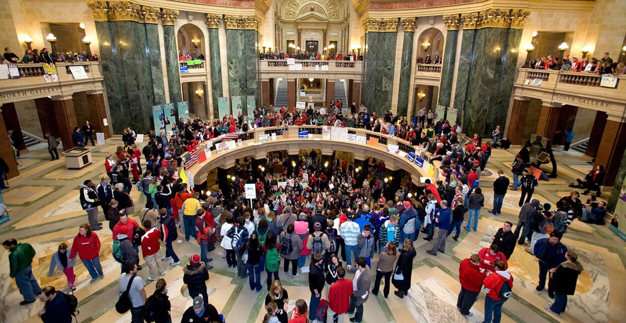 Wisconsin Unions Win Ruling in 14-Year Fight Against Reforms