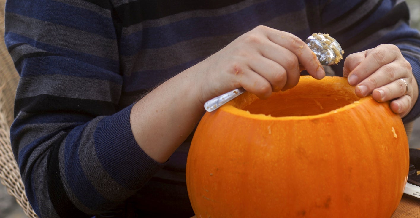 Government Employees Carve Jack-o’-Lanterns at Work